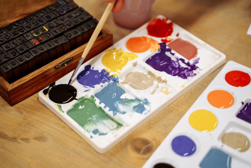 Multi-colored Paint and Brush for Drawing. Process of Drawing. Stock ...