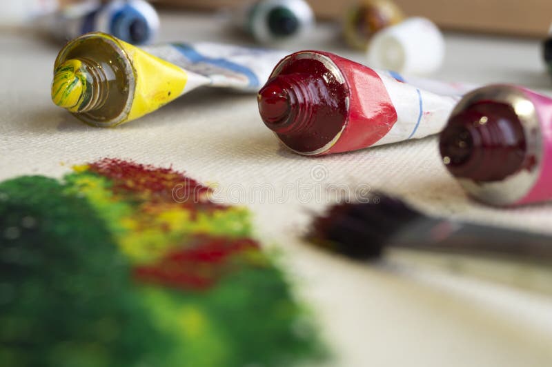 Multi-colored Paint and Brush on Canvas Stock Image - Image of paints ...