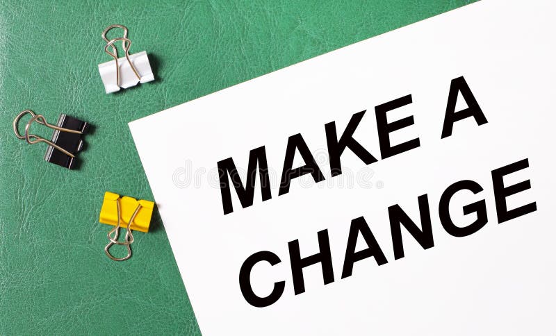 Multi-colored Paper Clips and a Sheet of Paper with the Text MAKE a ...