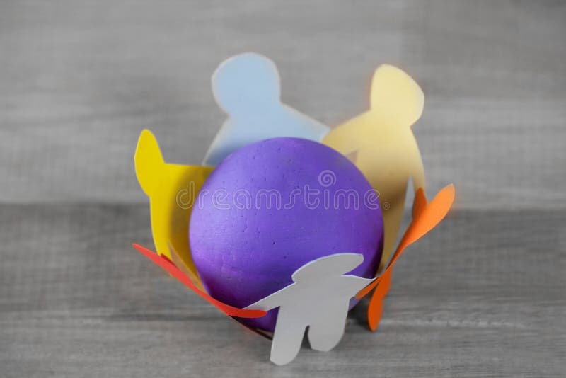 Multi Colored Paper Cut Out Figures Forming Circle Around Ball Stock ...