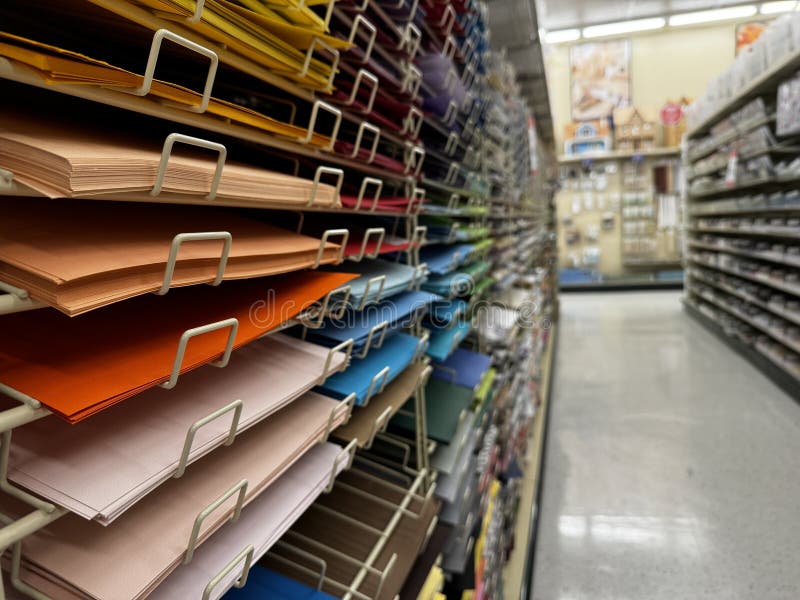 Multi-colored Paper Sheets Stacked on Shelves in a Craft Store Aisle ...