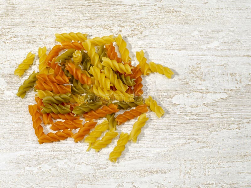 Multi-colored Pasta Scattered on the Kitchen Table Stock Image - Image ...