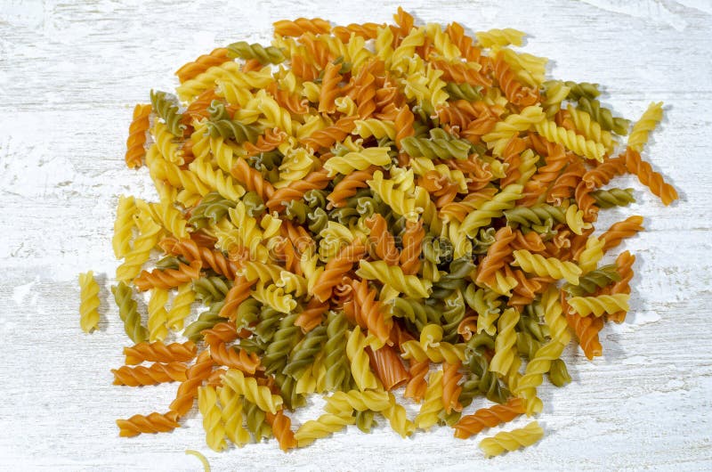 Multi-colored Pasta Scattered on the Kitchen Table Stock Image - Image ...