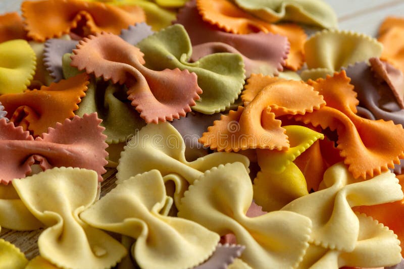 Multi-colored Pasta in the Shape of a Bow Tie is Laid Out on the ...