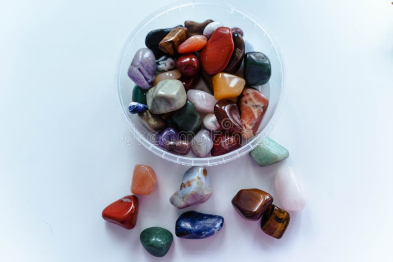 Multi-colored Pebbles of Different Sizes on a White Background Stock ...