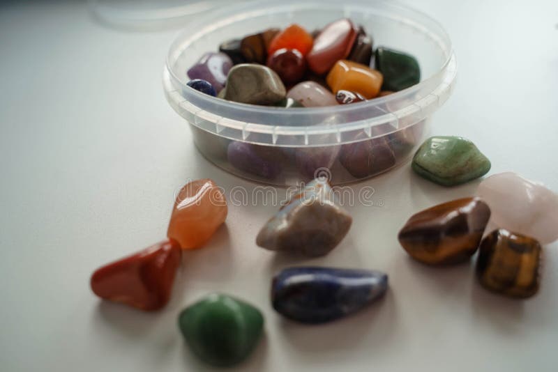 Multi-colored Pebbles of Different Sizes on a White Background Stock ...