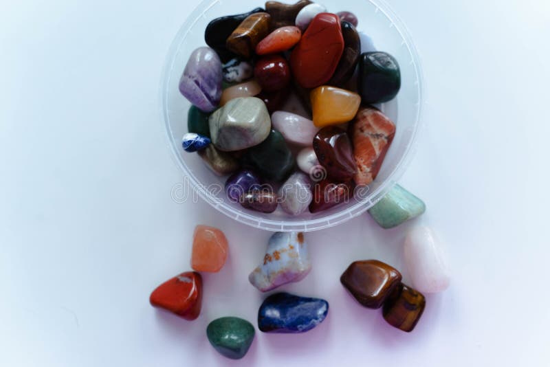Multi-colored Pebbles of Different Sizes on a White Background Stock ...