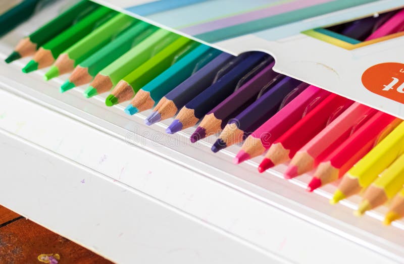 Multi-colored Pencils in Box on White Stock Image - Image of education ...