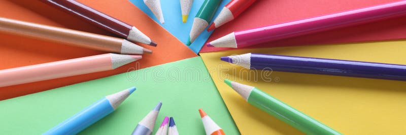 Multi-colored Pencils on Colored Paper on Table Stock Image - Image of ...