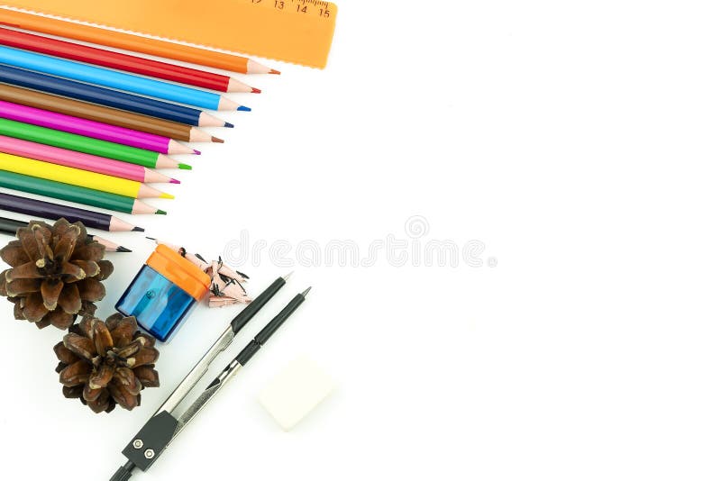 Multi-colored Pencils, Eraser, Ruler, Sharpener and Compasses on a ...