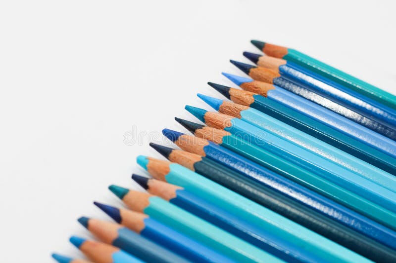 Multi Colored Pencils Lie White Table Blue Range Colors Stock Photos ...