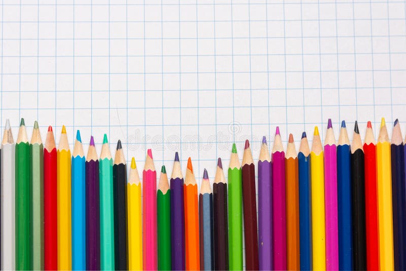 Multi-colored Pencils are on a White Checkered Sheet. Drawing Lesson ...