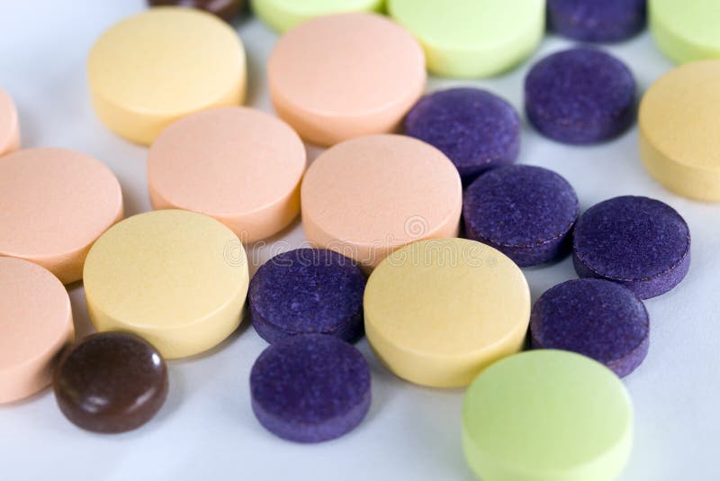 Multi-colored pills stock image. Image of prescription - 223379499