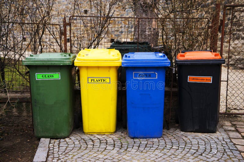 Multi-colored Plastic Garbage Containers for Different Garbage are on ...