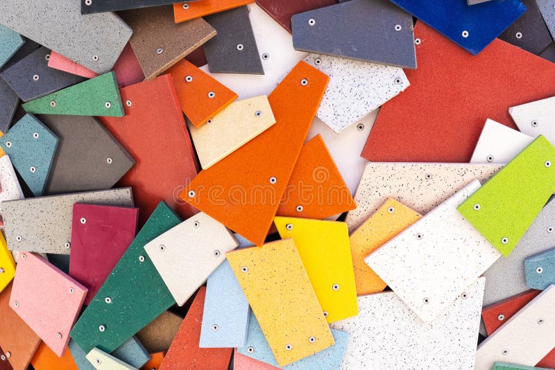 Multi-colored Plastic Pieces Held Together by Rivets Stock Image ...