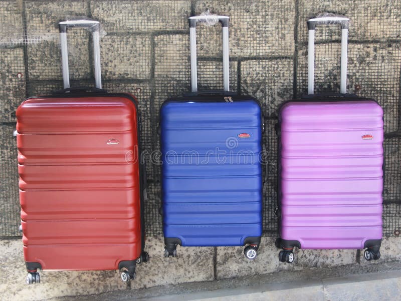 Multi-colored Plastic Suitcases for Carrying Things Stock Photo - Image ...
