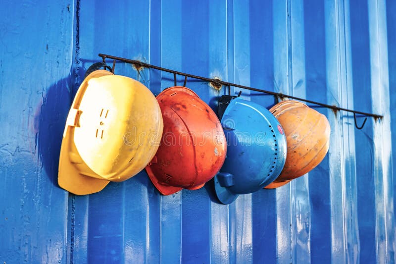 Multi-colored Protective Construction Helmets. Coordinated Work of the ...