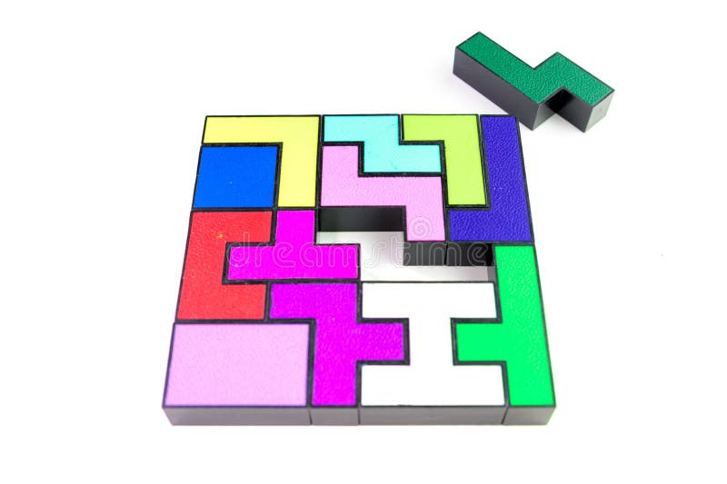 Multi-colored Puzzle Made of Plastic Blocks, that`s Missing One Piece ... Multi-colored Puzzle Made of Plastic Blocks, that`s Missing One Piece ...
