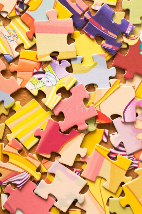 Multi-colored Puzzles Scattered on the Table Stock Image - Image of ...