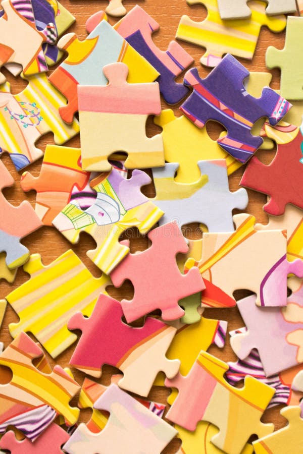 Multi-colored Puzzles Scattered on the Table Stock Image - Image of ...