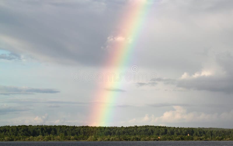 Multi-colored Rainbow in Sky Stock Photo - Image of idyllic, season ...