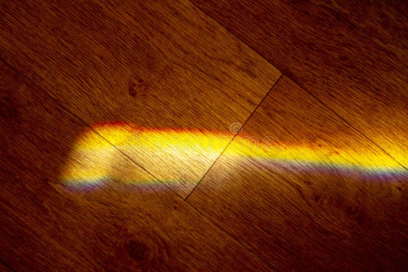 Multi-colored Reflection of Light from a Mirror on the Floor. Sunlight ...