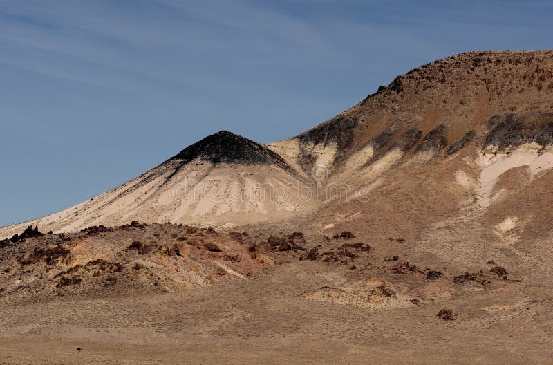 Multi-colored rock layers stock photo. Image of mountains - 241822894