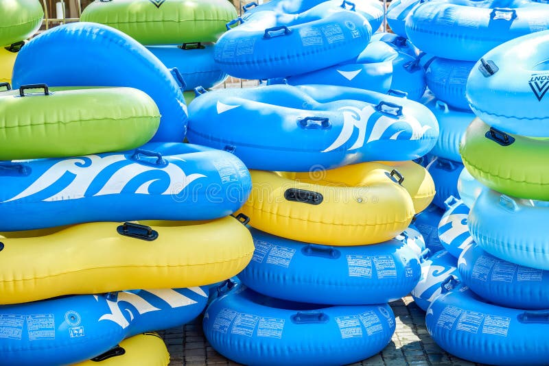 Multi-colored Rubber Rings for Swimming Pool Put in Rows Editorial ... Multi-colored Rubber Rings for Swimming Pool Put in Rows Editorial ...