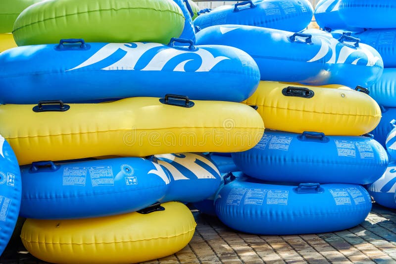 Multi-colored Rubber Rings for Swimming Pool Put in Rows Editorial ... Multi-colored Rubber Rings for Swimming Pool Put in Rows Editorial ...
