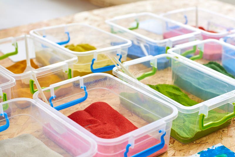 Multi-colored Sand for Drawing in Plastic Containers Stock Photo ...