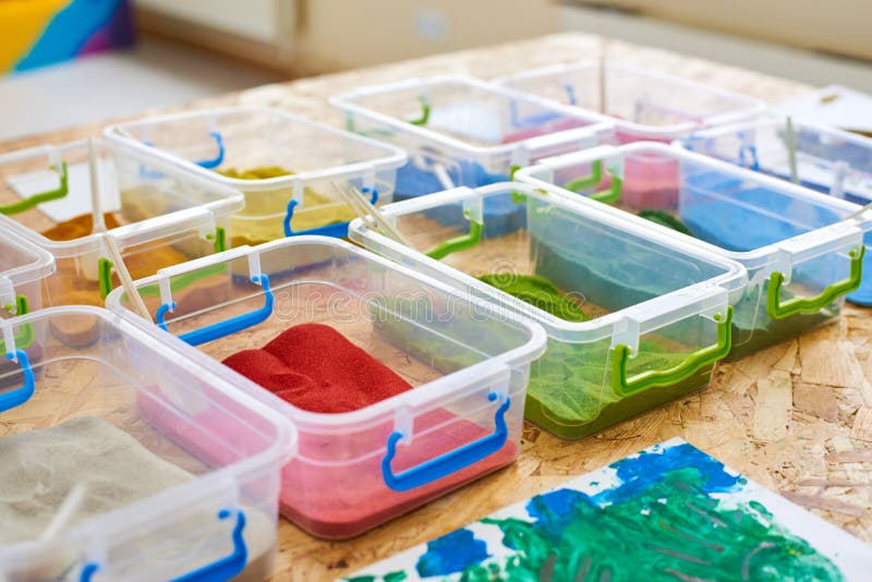 Multi-colored Sand for Drawing in Plastic Containers Stock Image ...