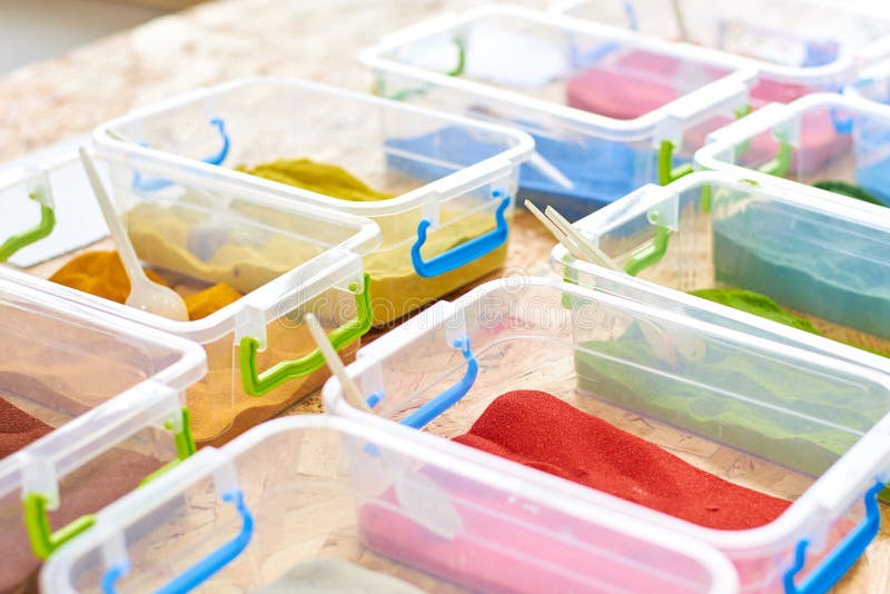 Multi-colored Sand for Drawing in Plastic Containers Stock Photo ...
