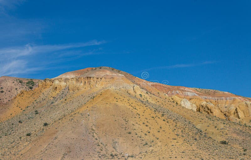 Multi-colored Sandstone Mountain Against the Blue Sky Stock Photo ...