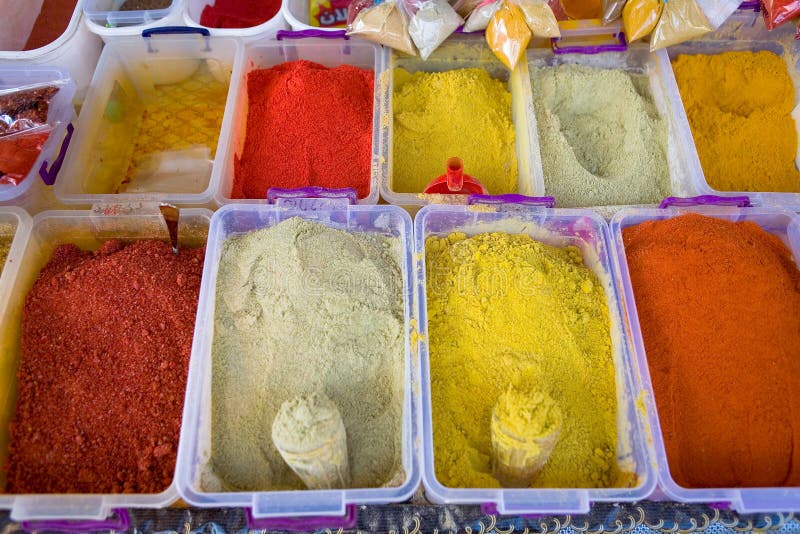 Multi-colored Seasonings in Containers on the Counter Stock Image ...