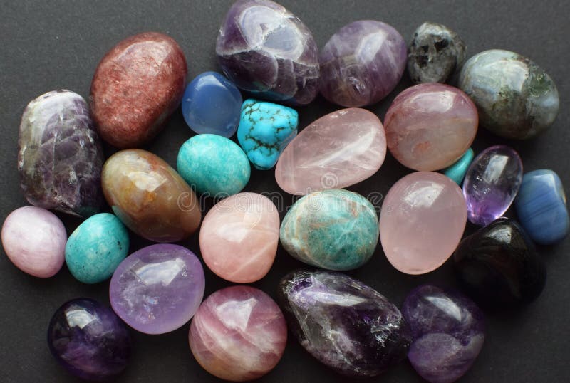 Multi-colored Semi-precious Stones on a Gray Background. Healing ...