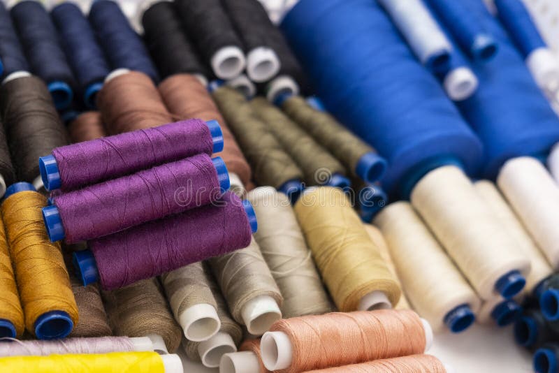 Multi-colored Sewing Threads Laid Out in a Row. Bright Background Stock ...