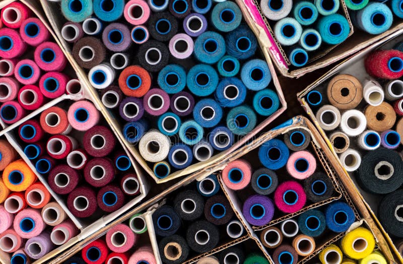 Multi-colored Sewing Threads Laid Out in a Row. Bright Background ...