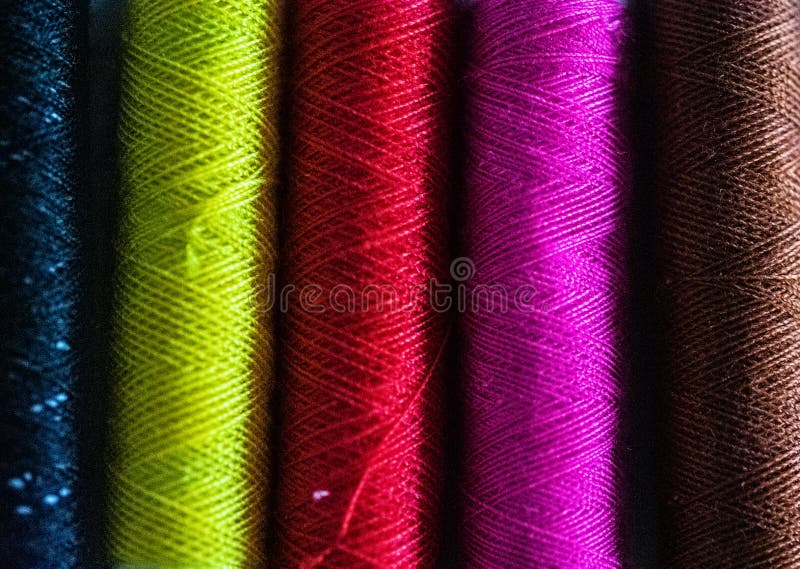 Multi Colored Sewing Threads in a Row Stock Photo - Image of sewing ...