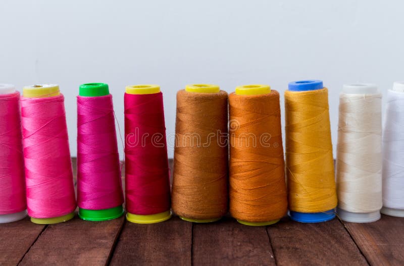 Multi-colored Sewing Threads Stand in a Row Stock Image - Image of ...