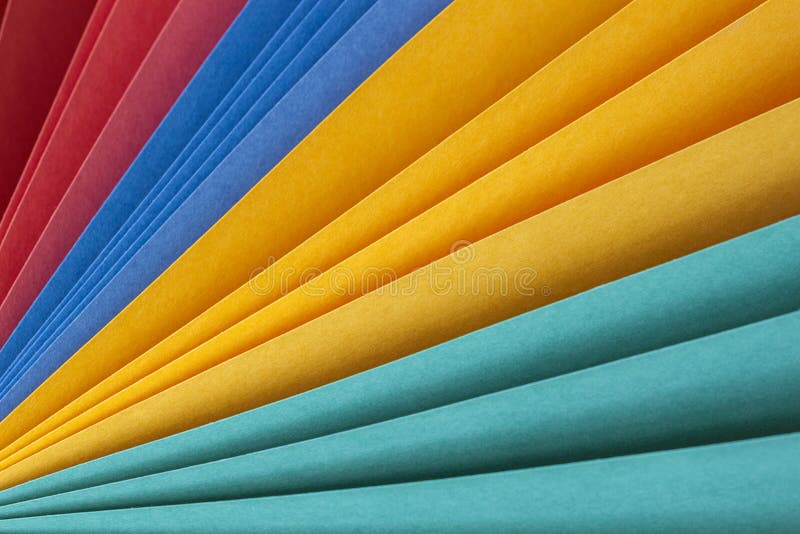 Multi-colored Sheets of Paper Folded Like Rainbow Fan. Abstract ...