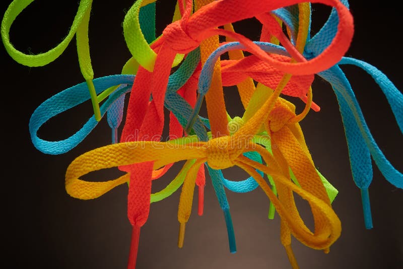 Brilliant Colored Shoe Laces Tied into Bows Stock Photo - Image of ...