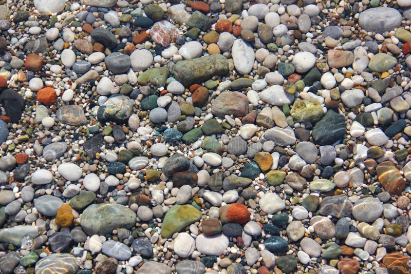 Multi-colored Small Smooth Stones Lie on the Bottom Stock Image - Image ...