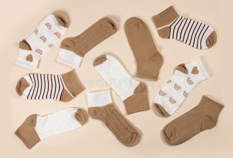 Multi-colored Socks on a Beige Background. View from Above Stock Photo ...
