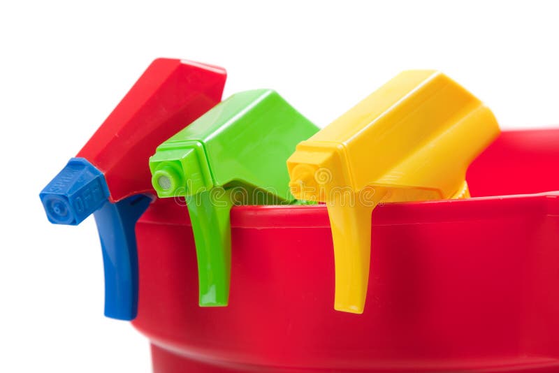 Multi Colored Spray Nozels in a Red Bucket Stock Photo - Image of ...