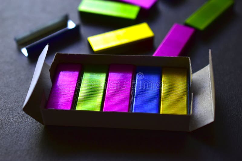 Multi-colored Stapler Staples on a Black Background Stock Photo - Image ...