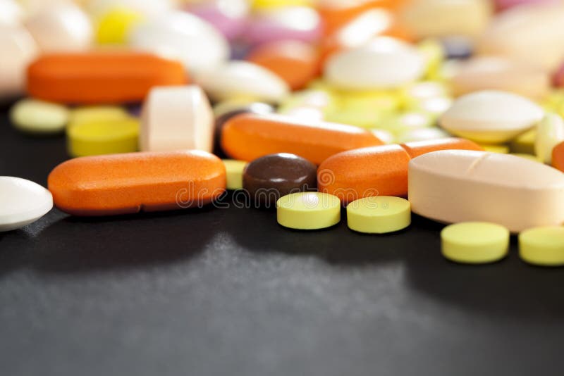 Multi-colored Tablets and Pills Stock Photo - Image of orange, health ...