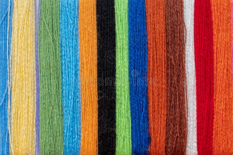 Multi-colored Thread for Embroidery is Laid Out in One Row. View from ...