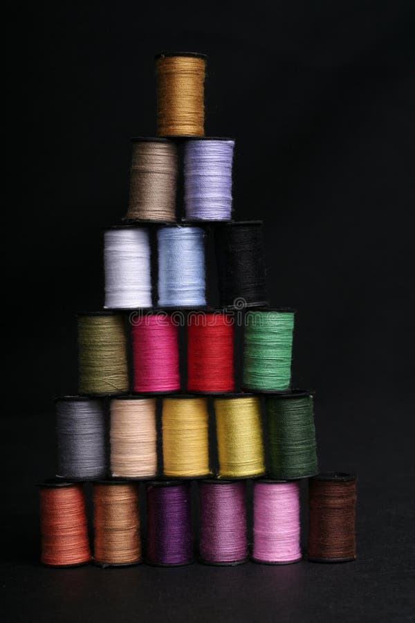 Multi-colored Thread Pyramid Stock Image - Image of spun, rainbow: 4025119