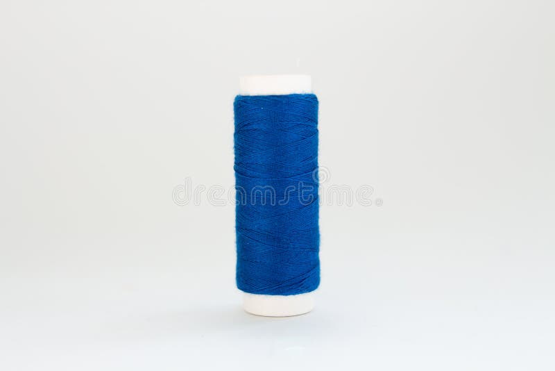 Blue Threads for Sewing on a White Background Stock Photo - Image of ...