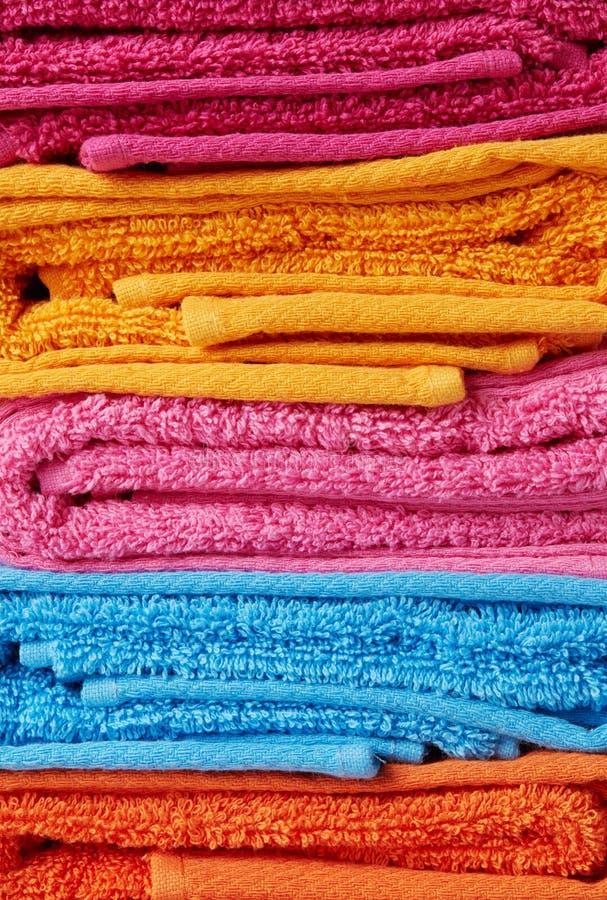Multi-colored towels stack stock image. Image of toiletries - 207521501